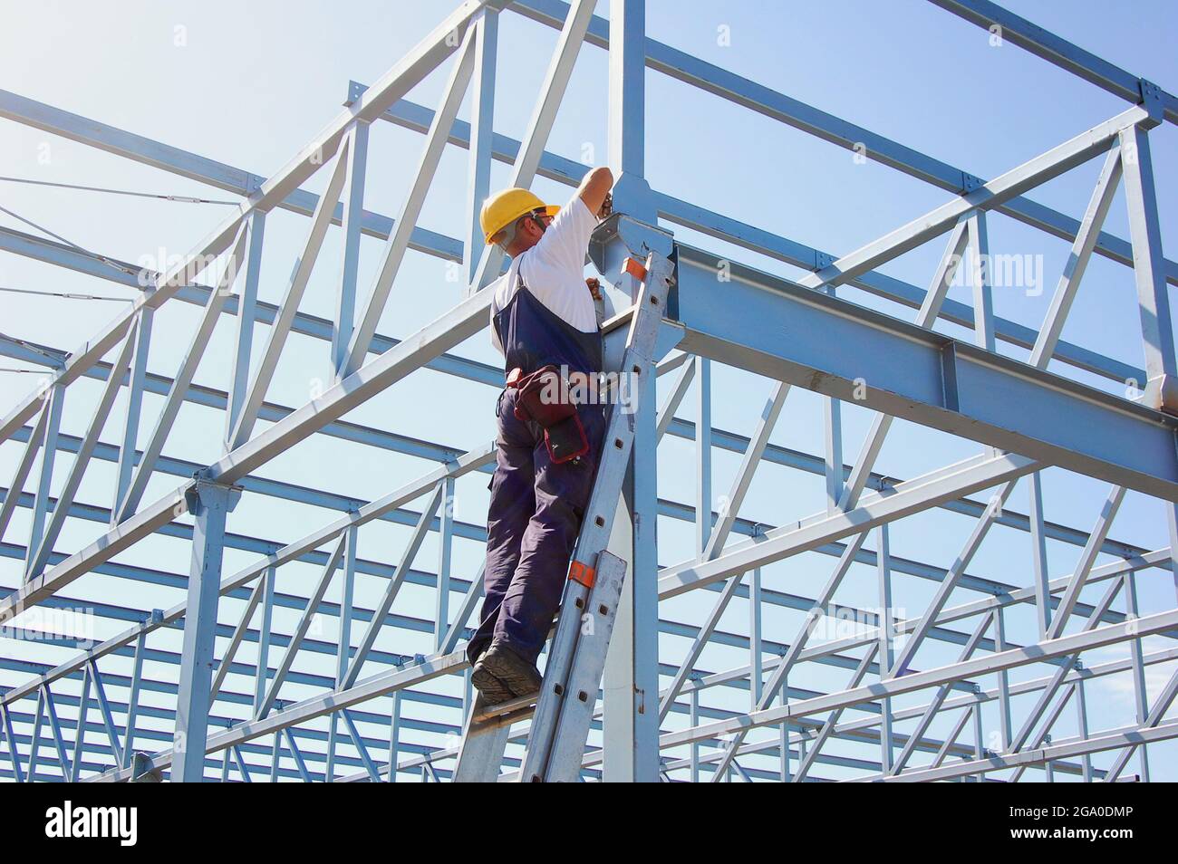 Iron Workers working on Iron Construction frame of tall apartment ...