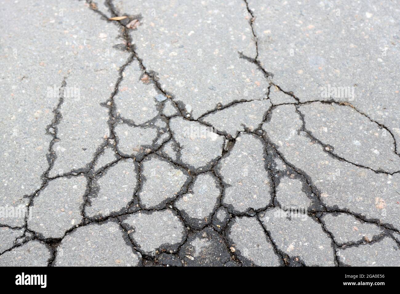 Cracked asphalt close up Stock Photo - Alamy