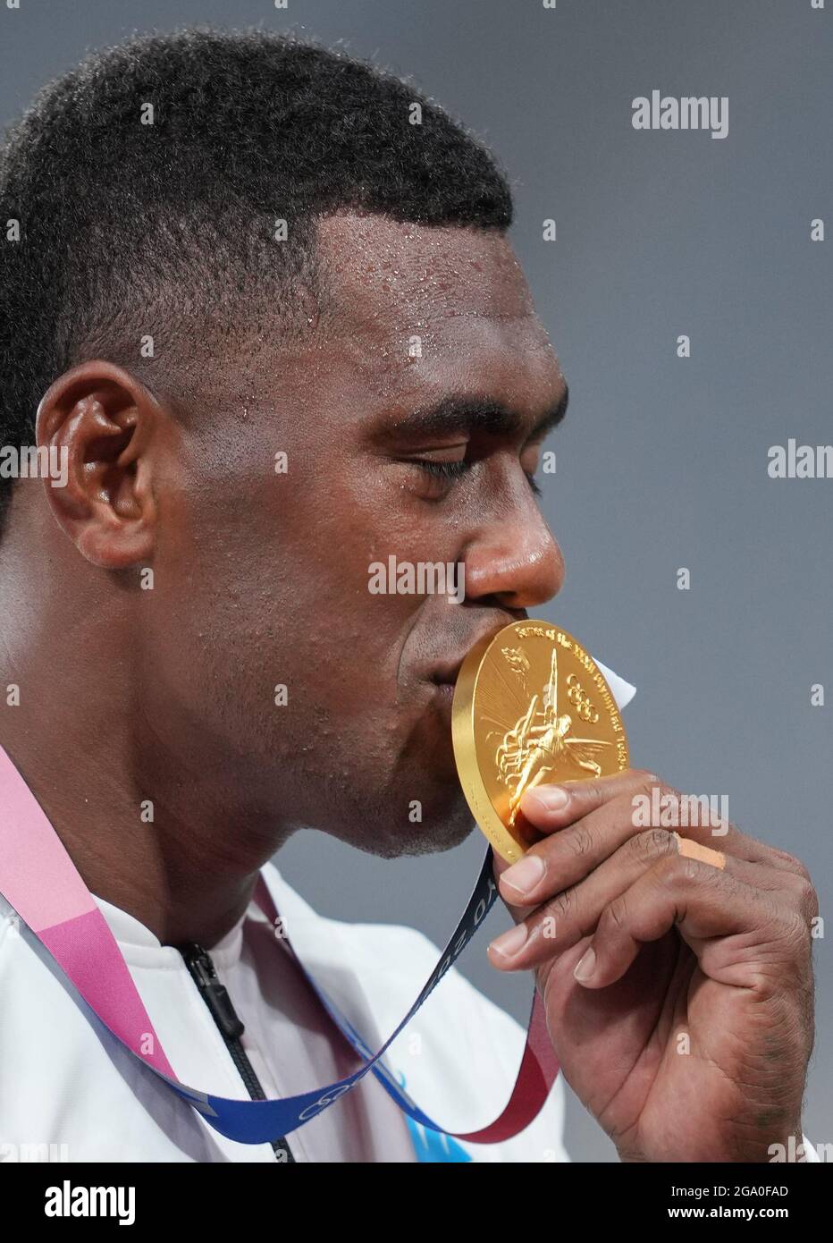 Tokyo, Japan. 28th July, 2021. Napolioni Bolaca of Fiji kisses gold ...