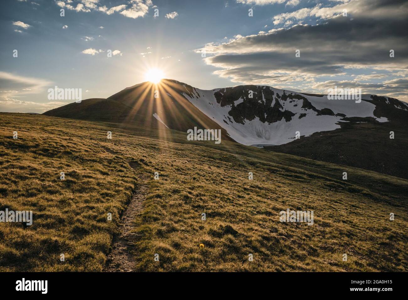 Sun sets clouds pass over hi-res stock photography and images - Alamy