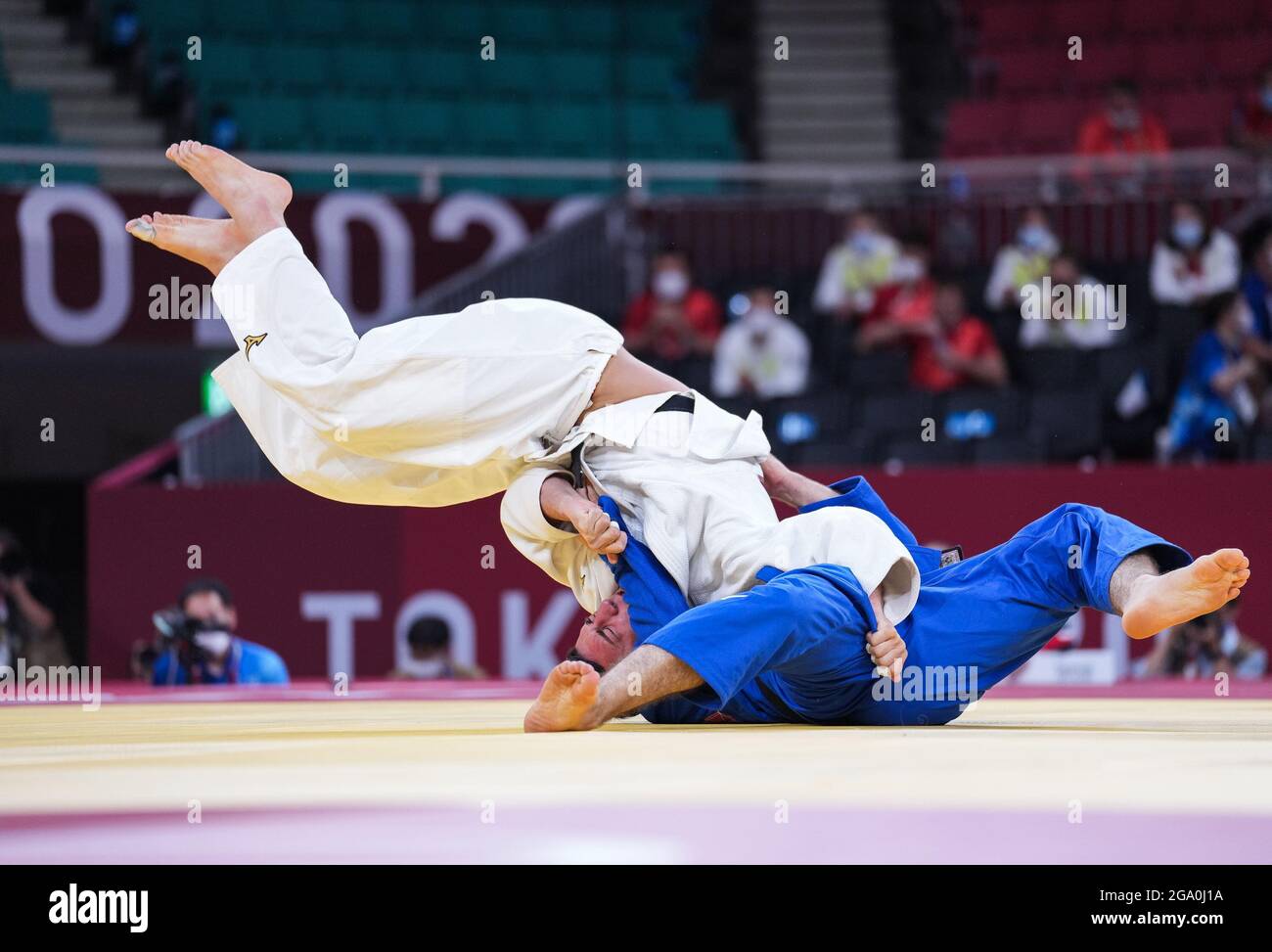 Tokyo, Japan. 28th July, 2021. Lasha Bekauri (up) of Georgia combats ...