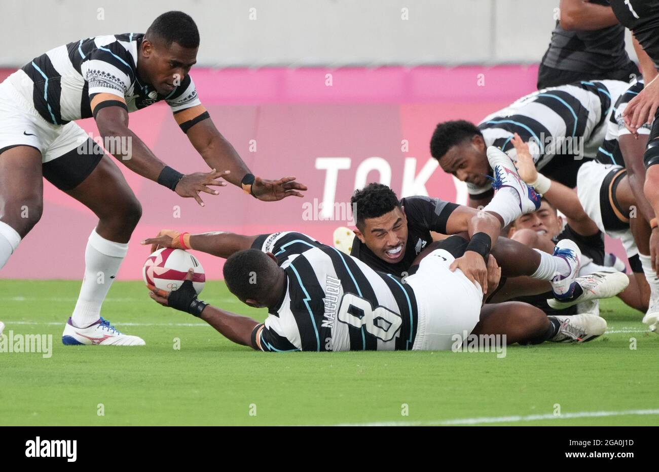 Tokyo, Japan. 28th July, 2021. Waisea Nacuqu of Fiji (2rd L) competes ...