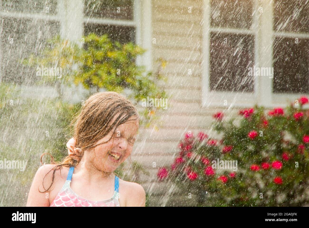 Summertime fun in the neighborhood Stock Photo - Alamy