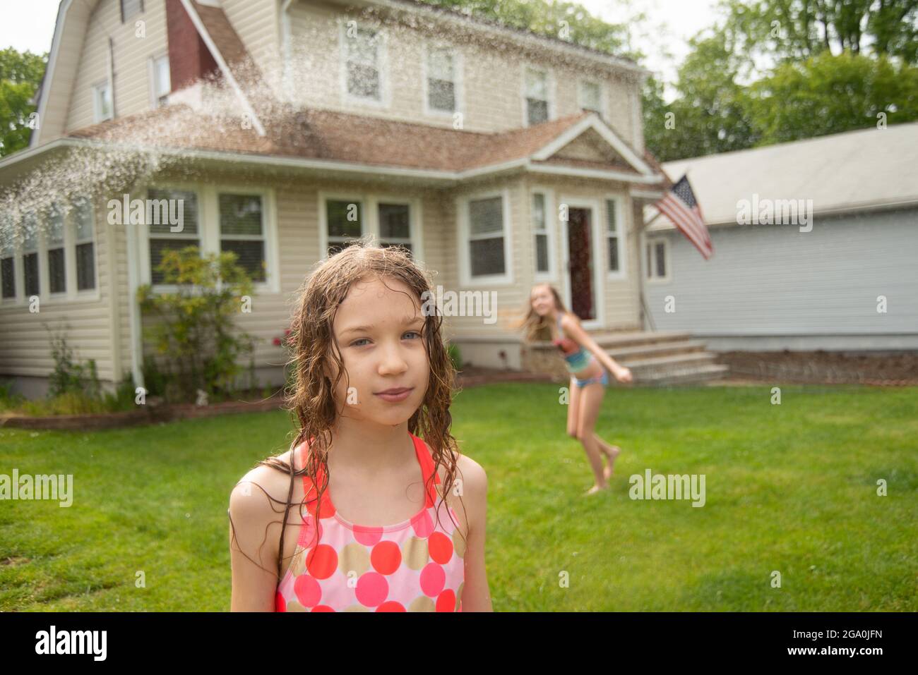 Summertime fun in the neighborhood Stock Photo - Alamy