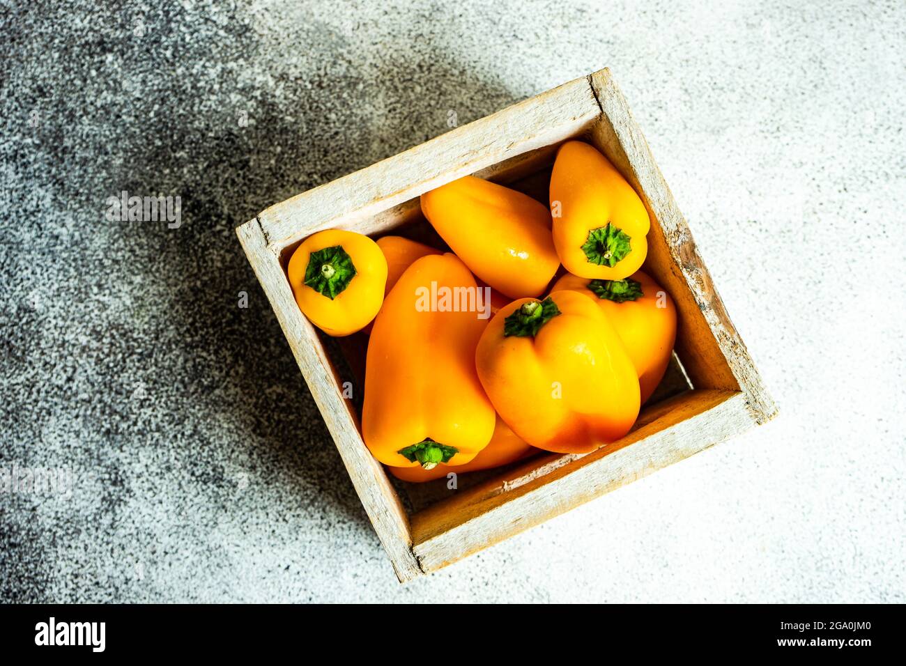 Fresh raw yellow pepper vegetable is ready for cooking Stock Photo - Alamy