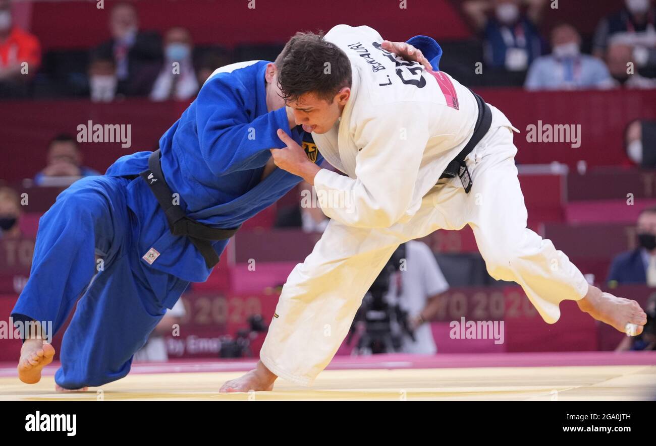 Tokyo, Japan. 28th July, 2021. Lasha Bekauri (R) of Georgia combats ...