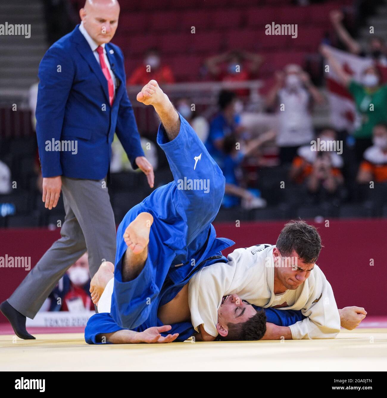 Tokyo, Japan. 28th July, 2021. Lasha Bekauri (up) of Georgia combats ...