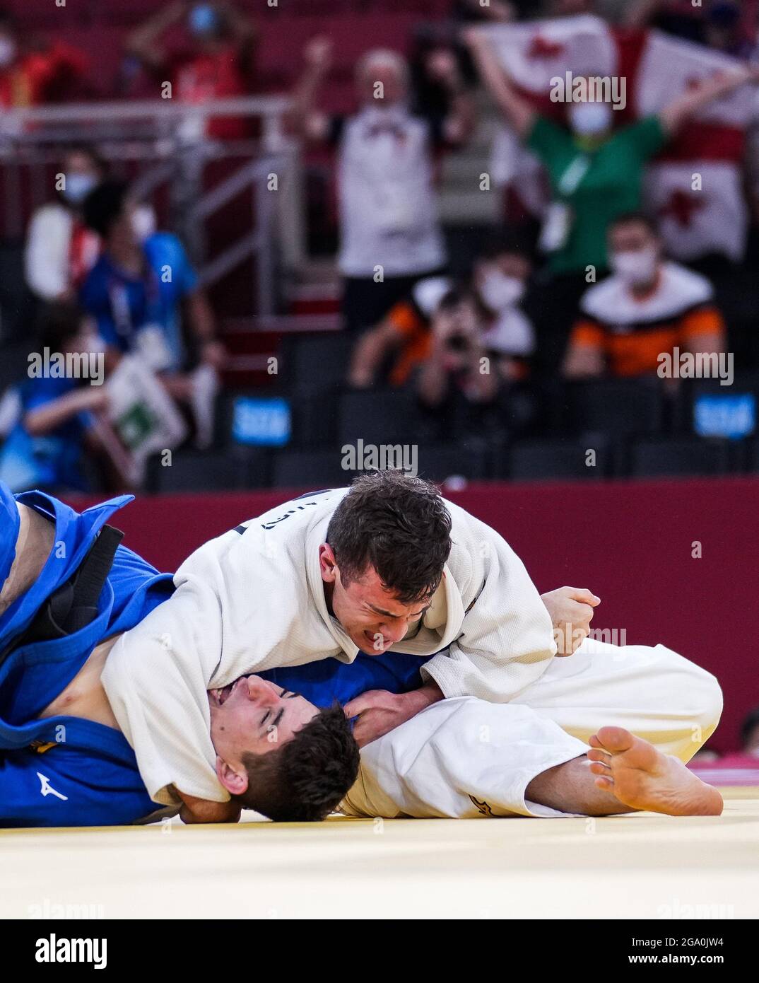 Tokyo, Japan. 28th July, 2021. Lasha Bekauri (up) of Georgia combats ...