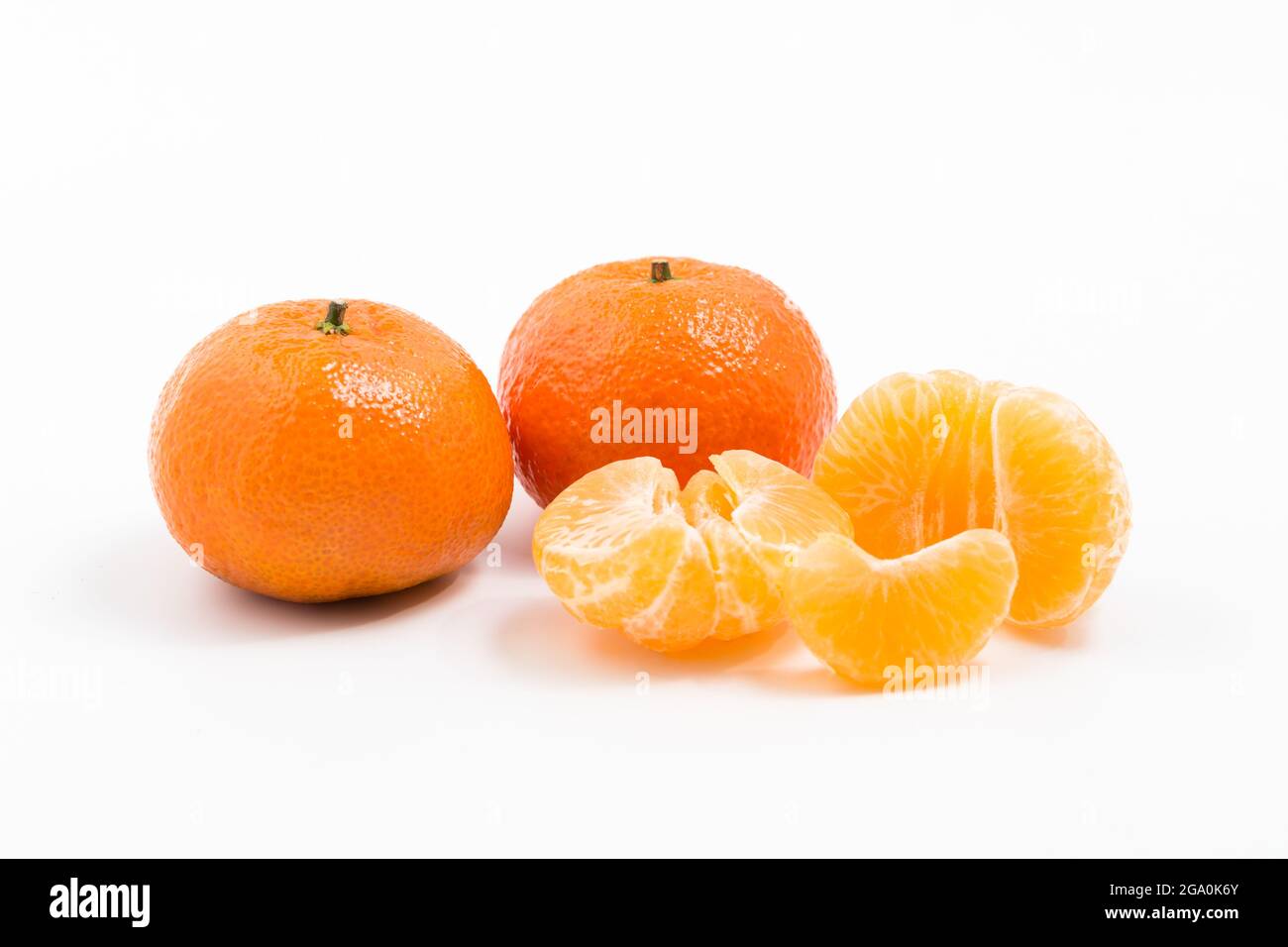 two tangerines on white background Stock Photo - Alamy