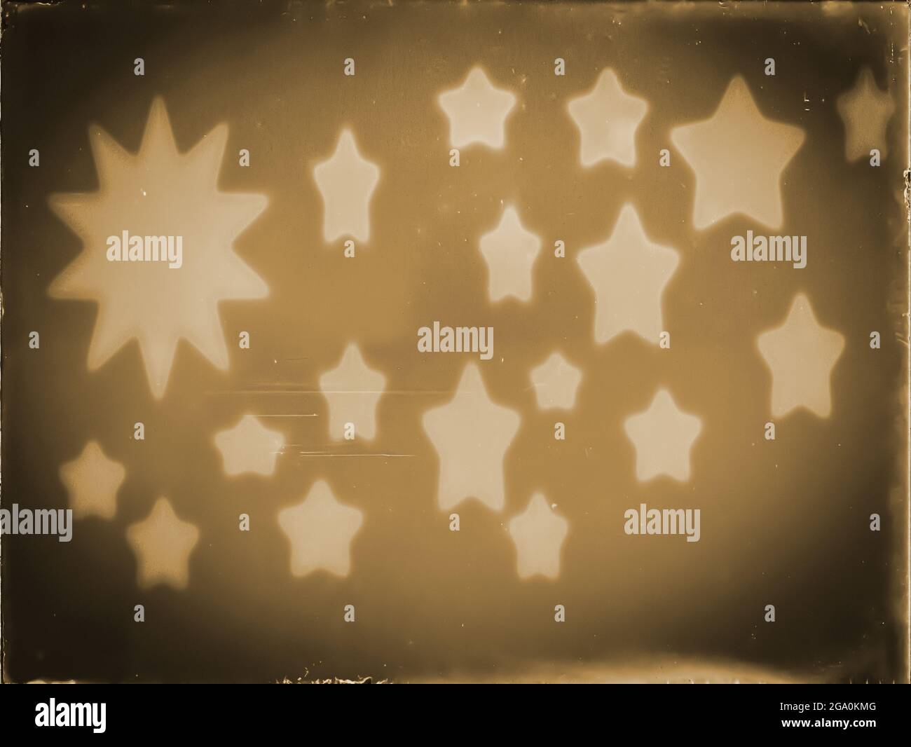 Sepia vintage background with golden stars Stock Photo - Alamy