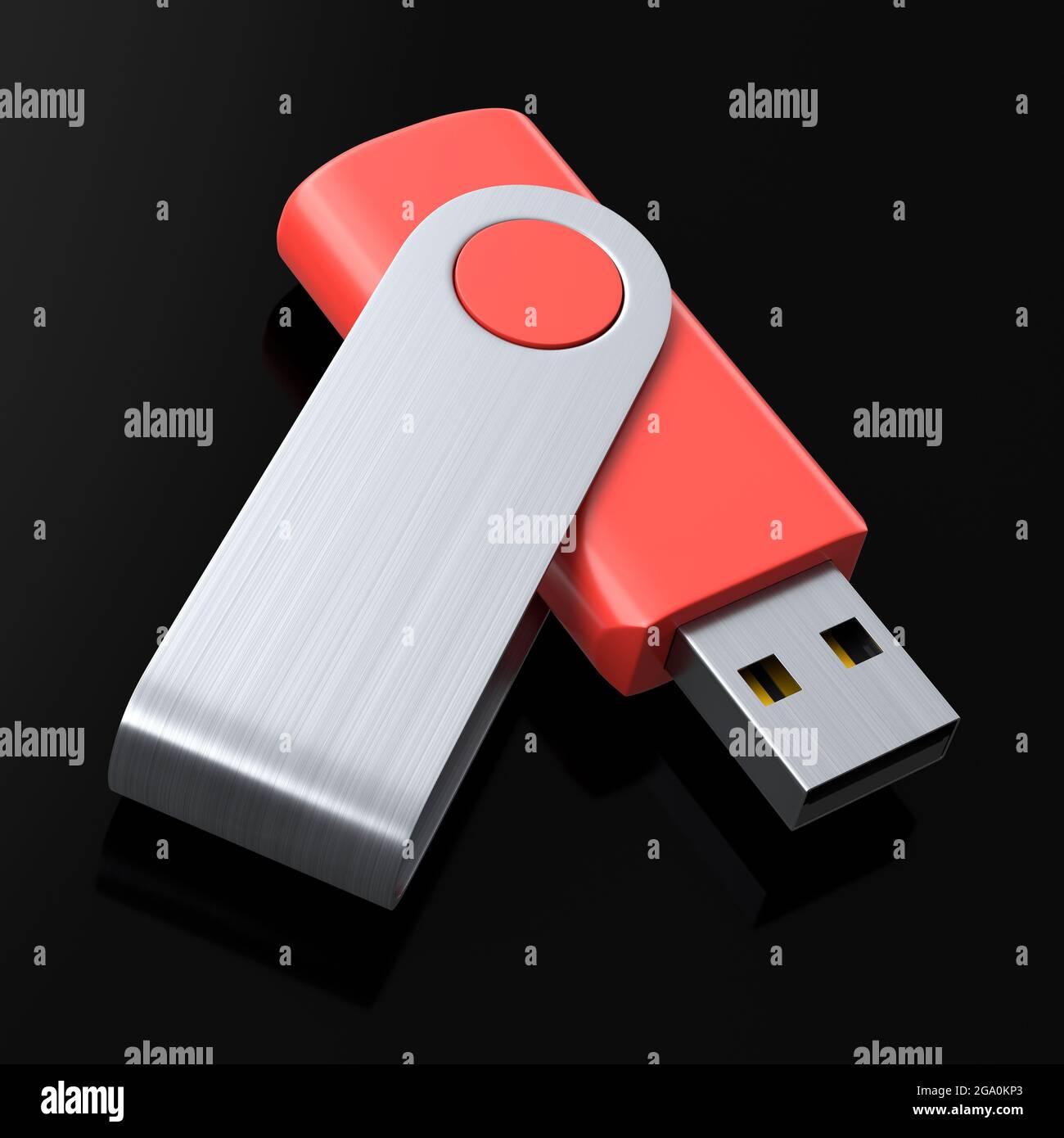 Portable red USB flash drive stick for workspace isolated on black ...