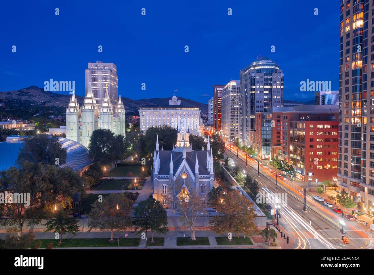 Salt Lake City, Utah, USA downtown cityscape over Temple Square at dusk ...