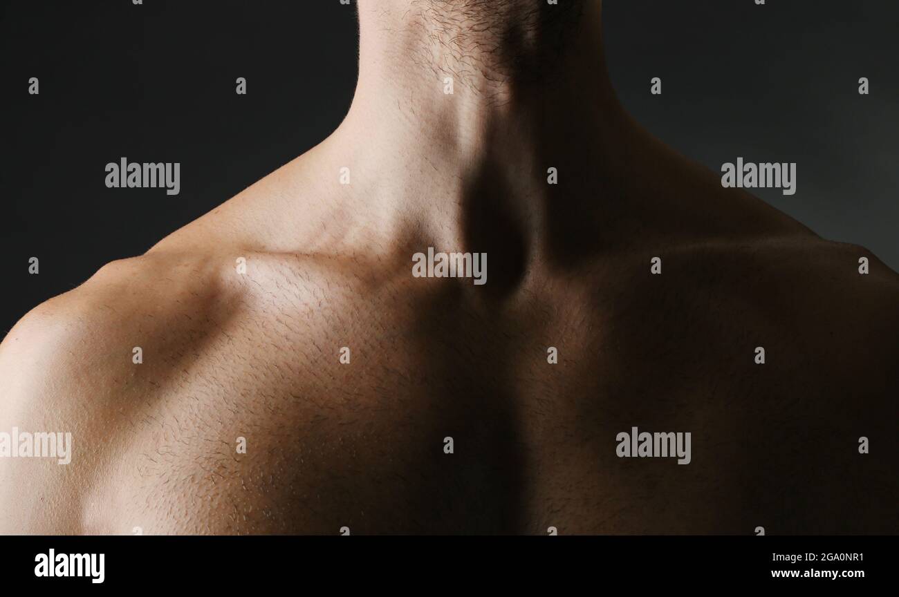 Muscle young man close up Stock Photo - Alamy