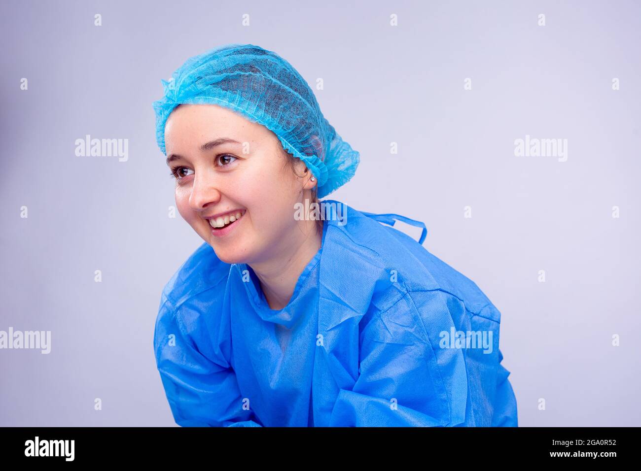 Medical sister is smiling very happy because of completed work in the ...