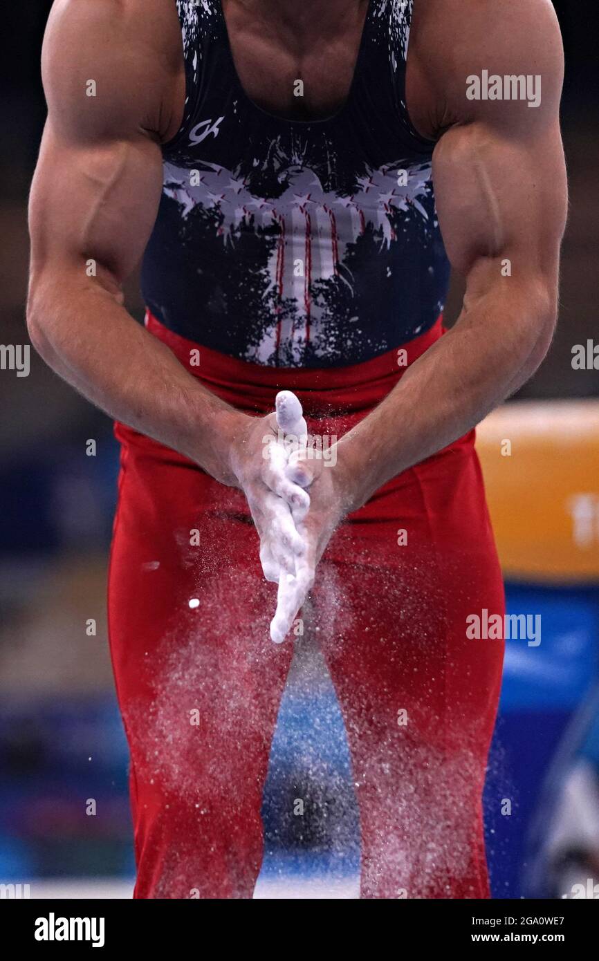 Tokyo, Japan. 28th July, 2021. Samuel Mikulak of the United States rubs ...