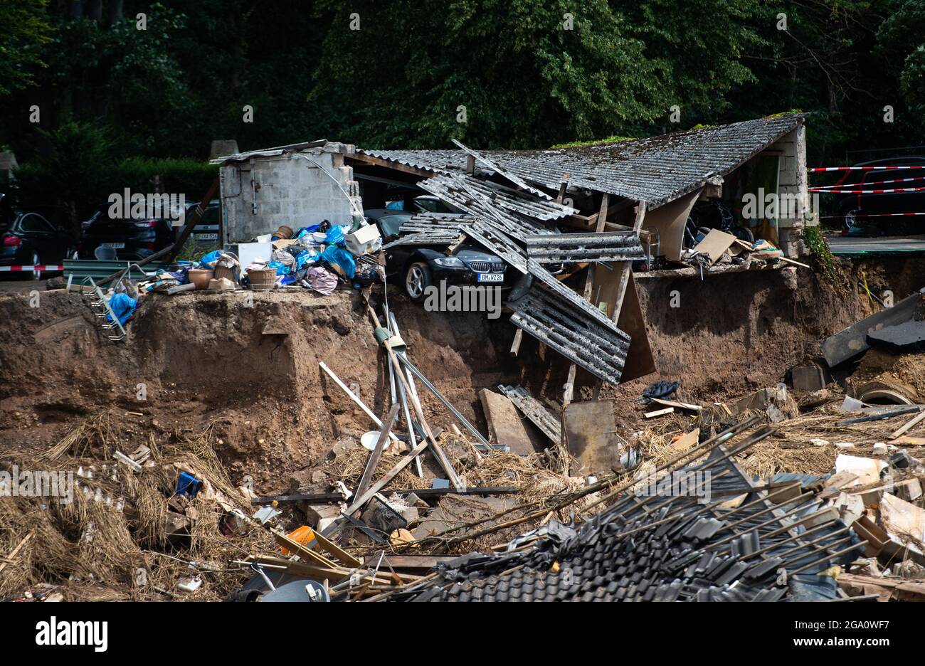 Erftstadt Blessem, Germany. 28th July, 2021. A car stands between ...