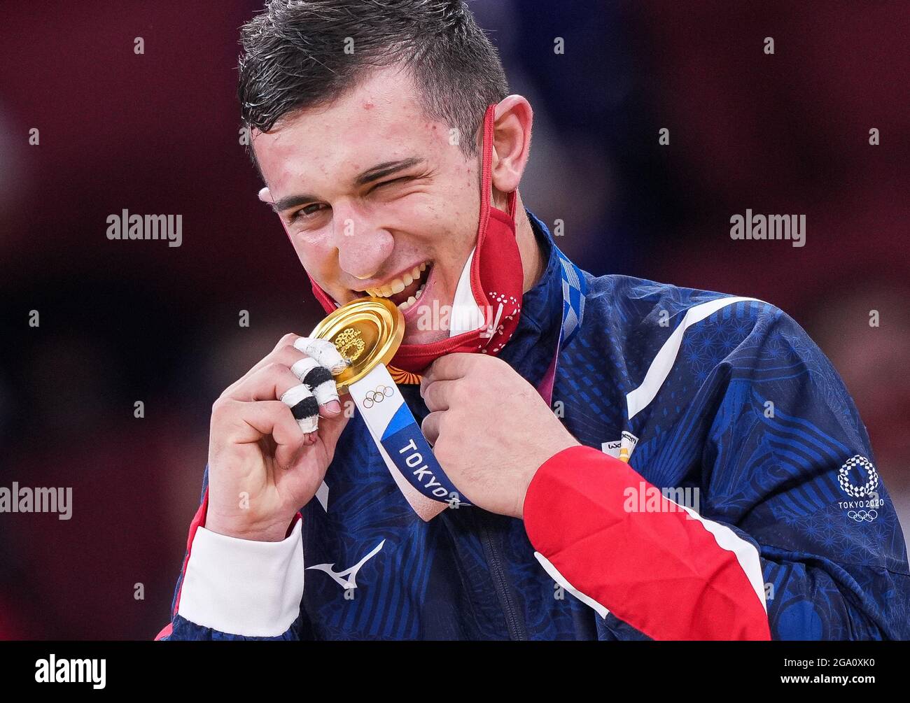 Tokyo, Japan. 28th July, 2021. Lasha Bekauri of Georgia bites his gold ...