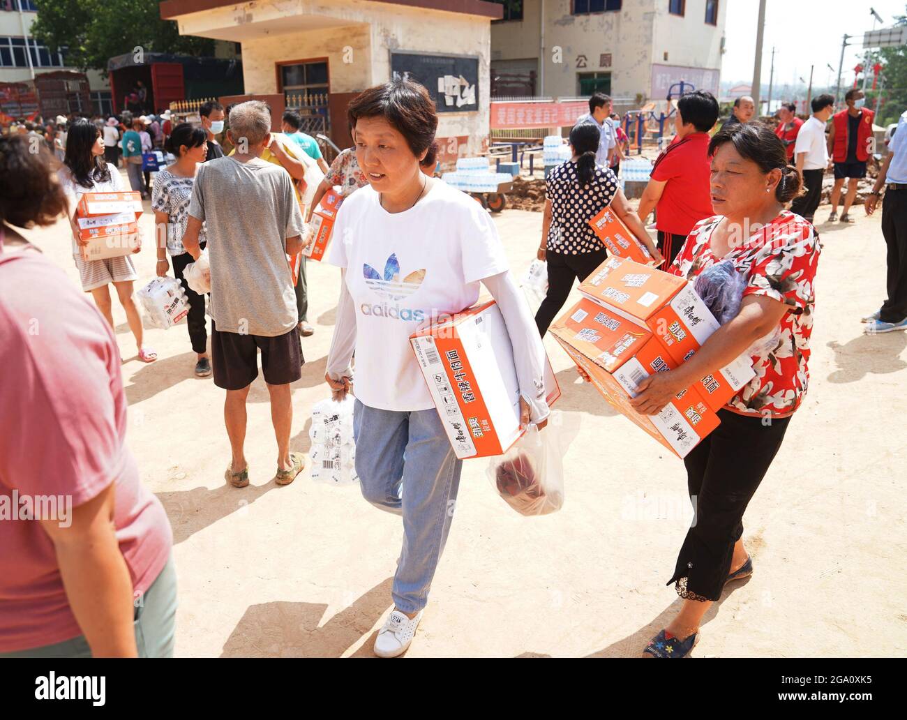 Gongyi, Zhengzhou, China, 27/07/2021, Affected villagers receive relief ...