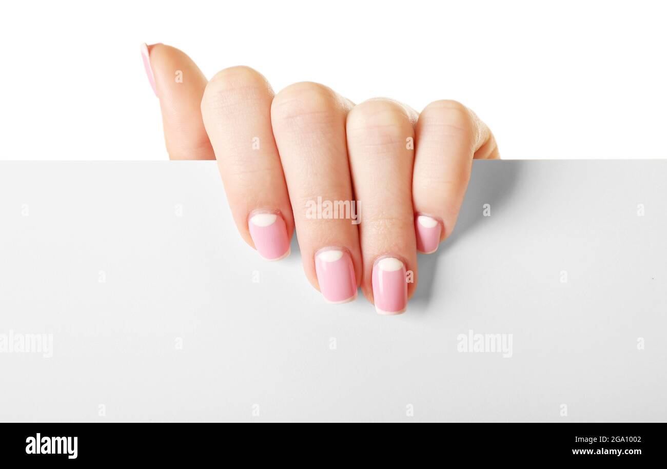 Female hand holding paper blank isolated on white Stock Photo - Alamy