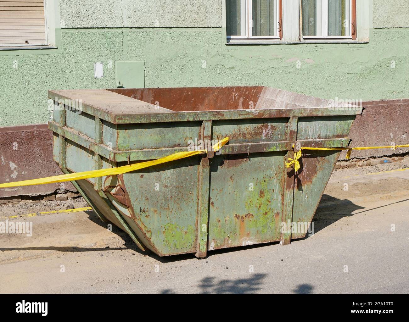Metal green trash can on the street hi-res stock photography and images ...