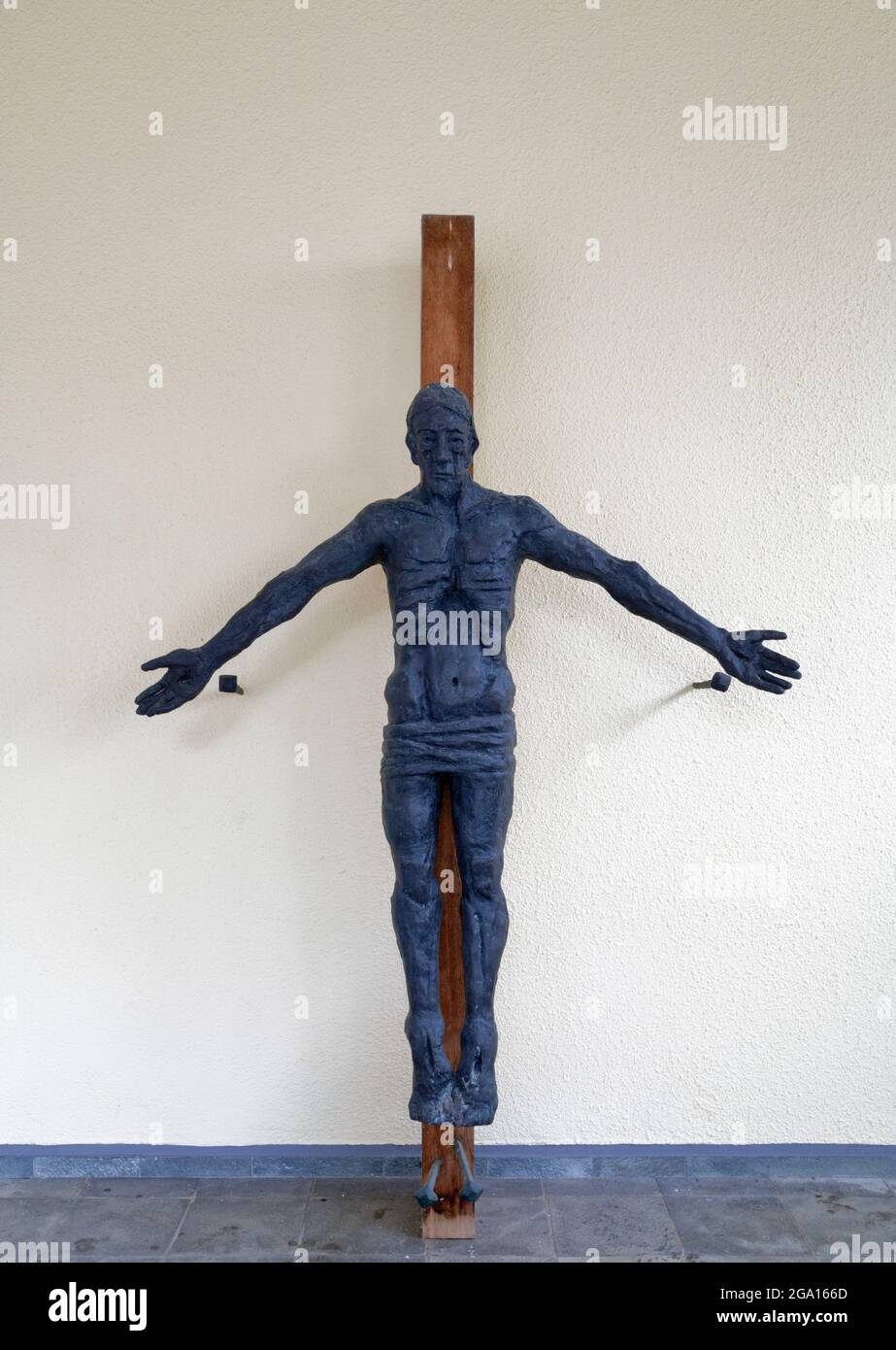 Bronze statue of Christ, by Sieger Köder and Rudolf Kurz, in cemetery ...
