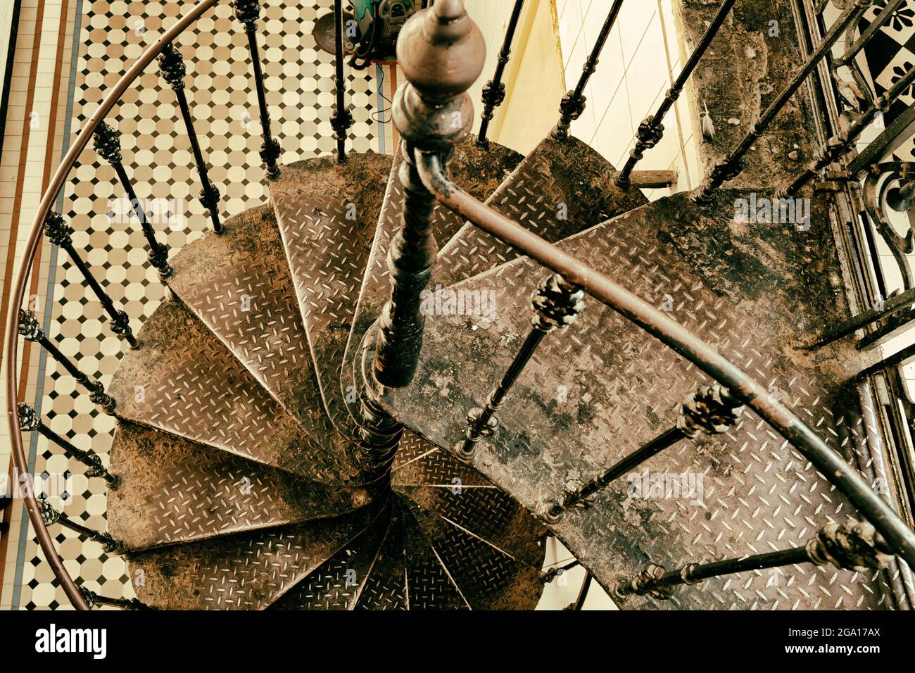 Beautiful old staircase with a railing called the snail ladder Stock ...