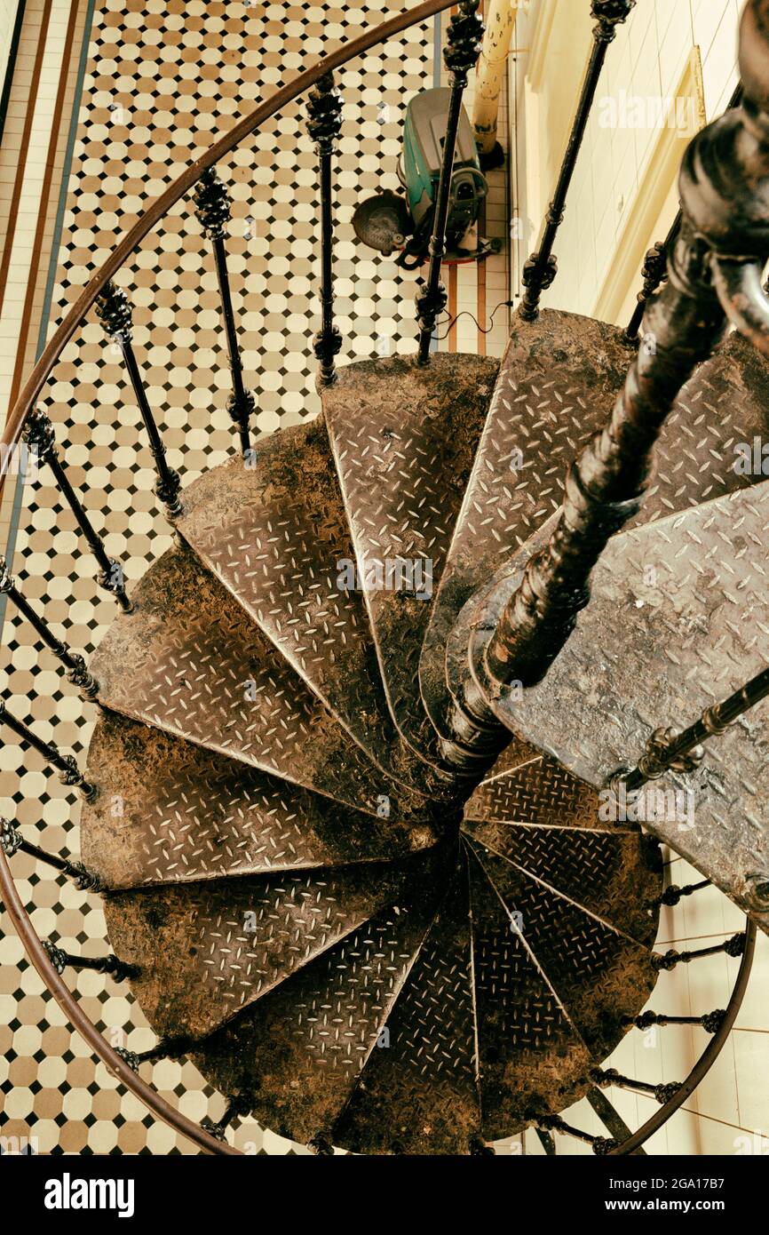 Old fashioned beautiful staircase with a railing called the snail ...
