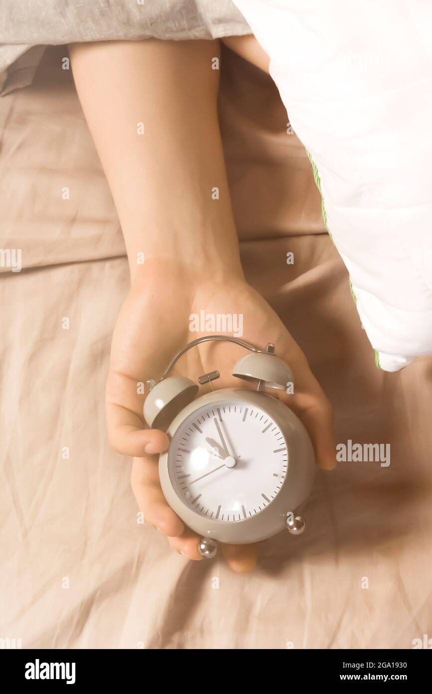 Person sleeping under a blanket hi-res stock photography and images - Alamy