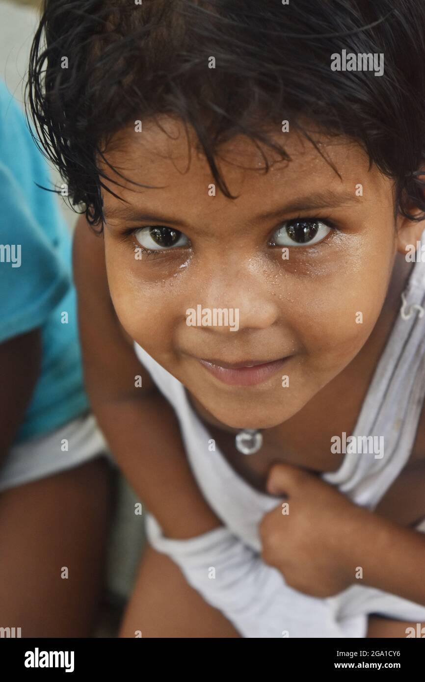 Portrait Of Young Poor Kid Stock Photo - Alamy