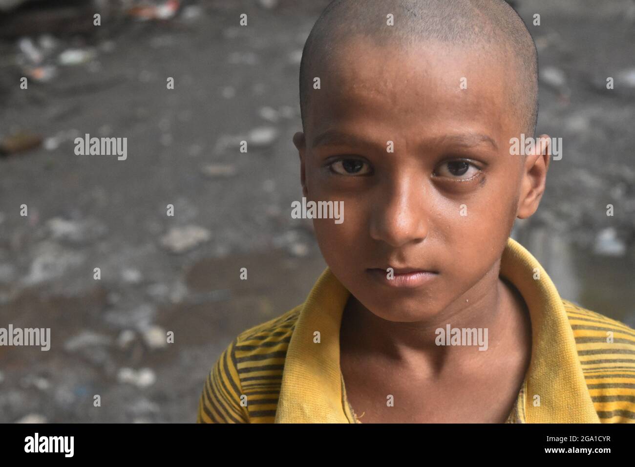 poor kid portrait Stock Photo - Alamy