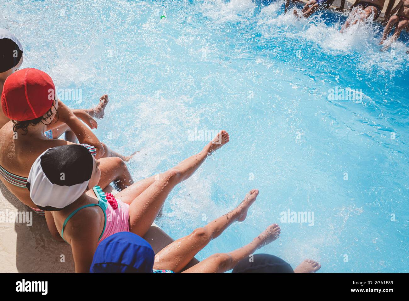 Santa Maria di Leuca, Italy - July 2021 - Kids having fun splashing in ...