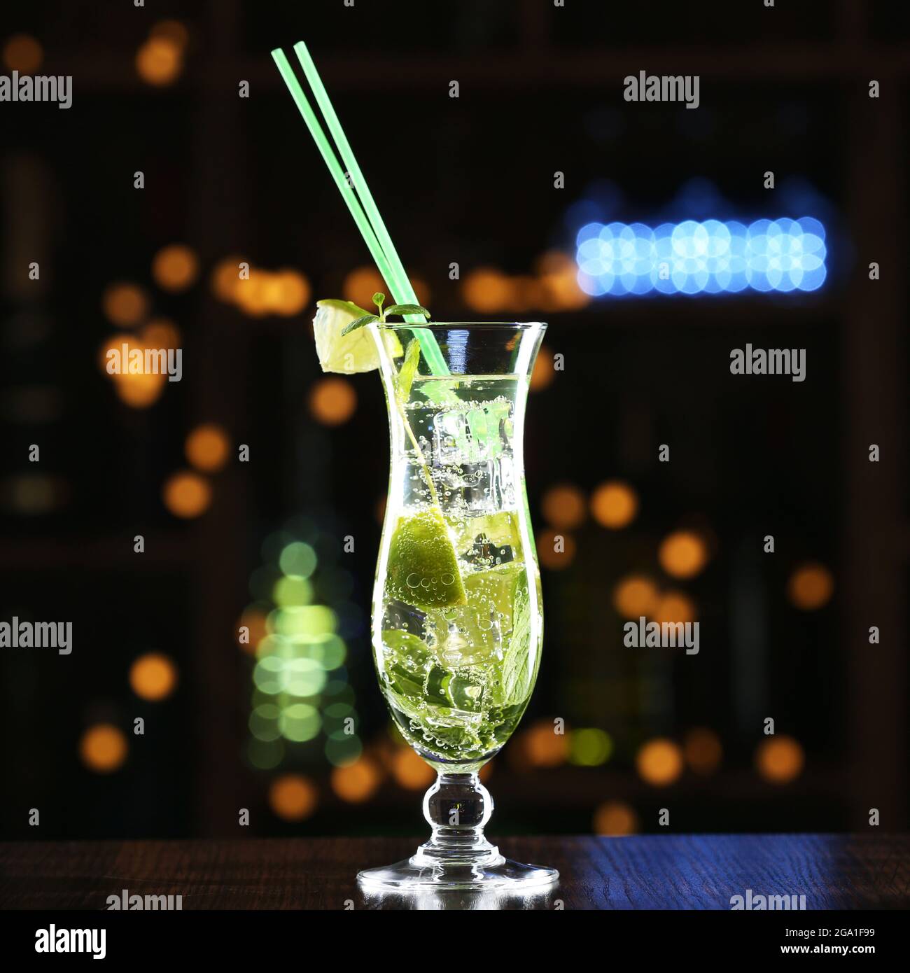 Glass of cocktails on bar background Stock Photo - Alamy