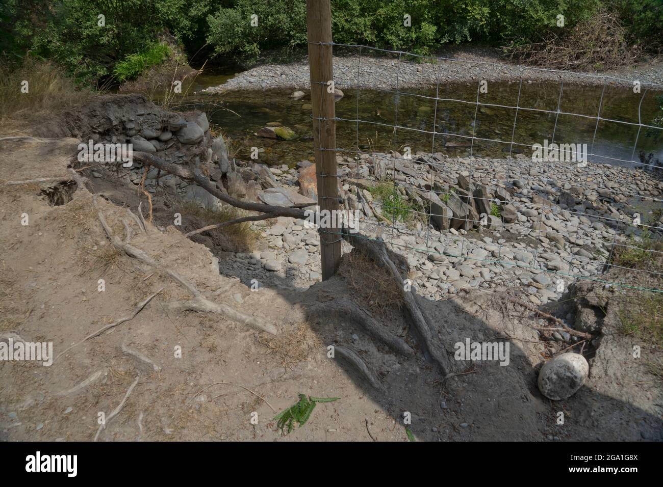 Bilingual warning signs in Welsh and English due to erosion of river ...