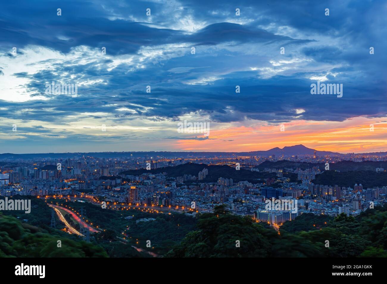 Sunset high angle view of the cityscape form Wenshan District at Taipei ...