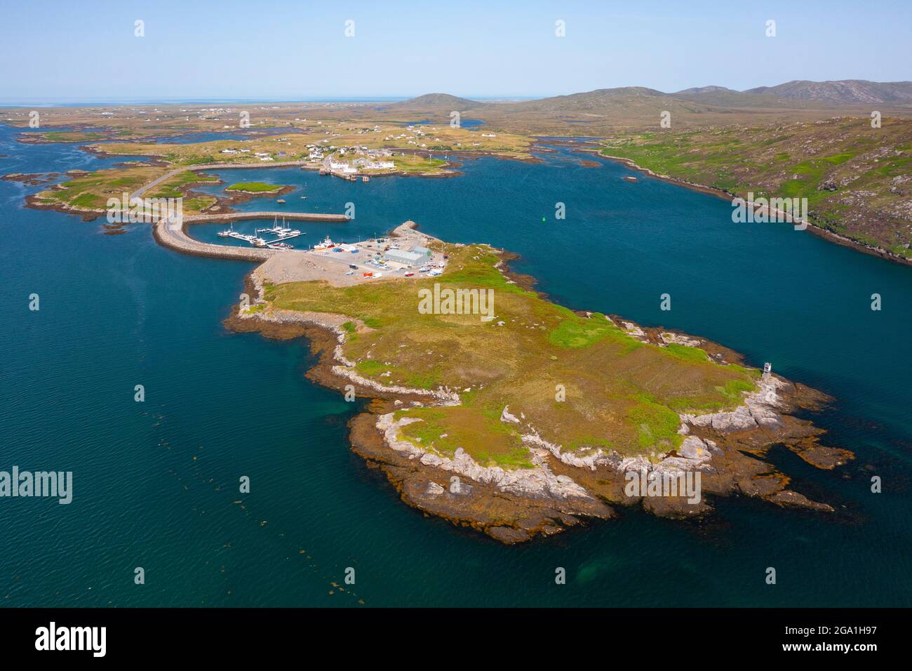 Aerial view from drone of port and village at Lochboisdale on island of ...