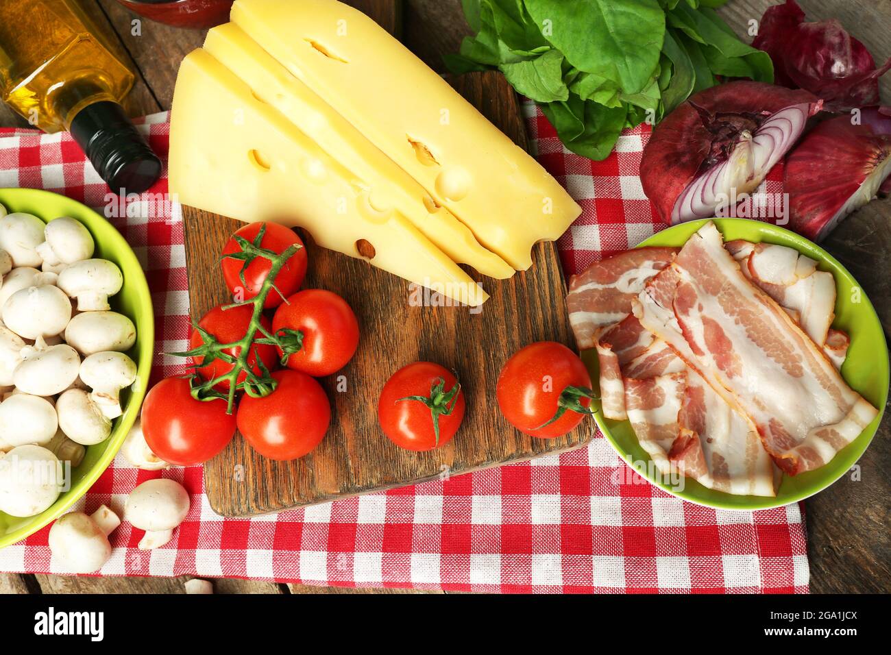 Food ingredients for cooking on table close up Stock Photo - Alamy