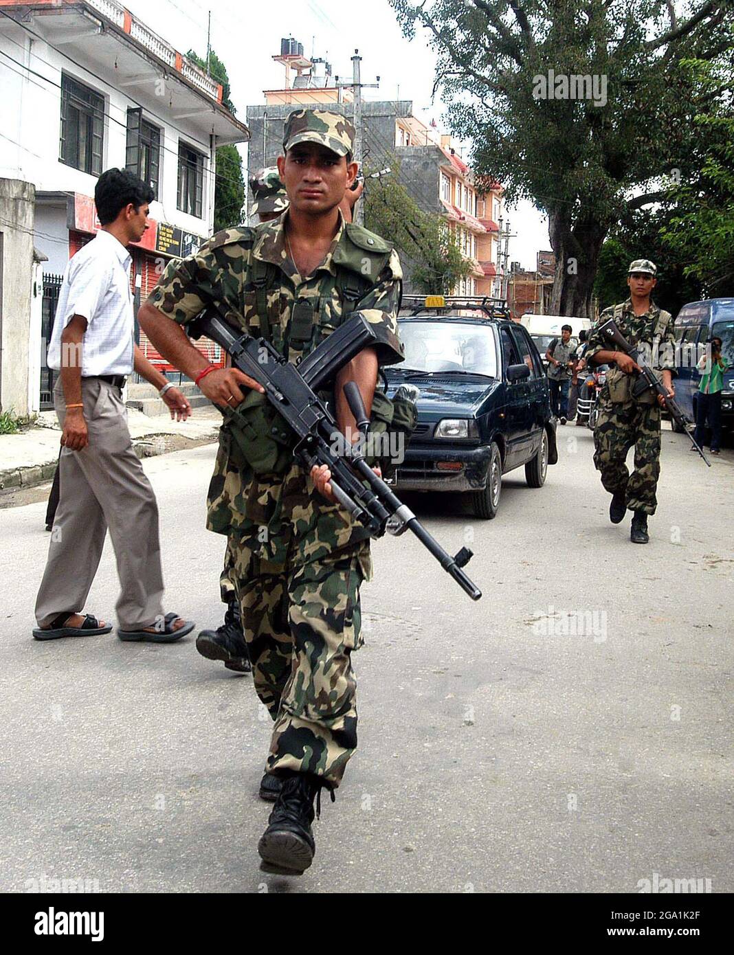 Army Soldiers checking a damaged building. Nepal Stock Photo - Alamy