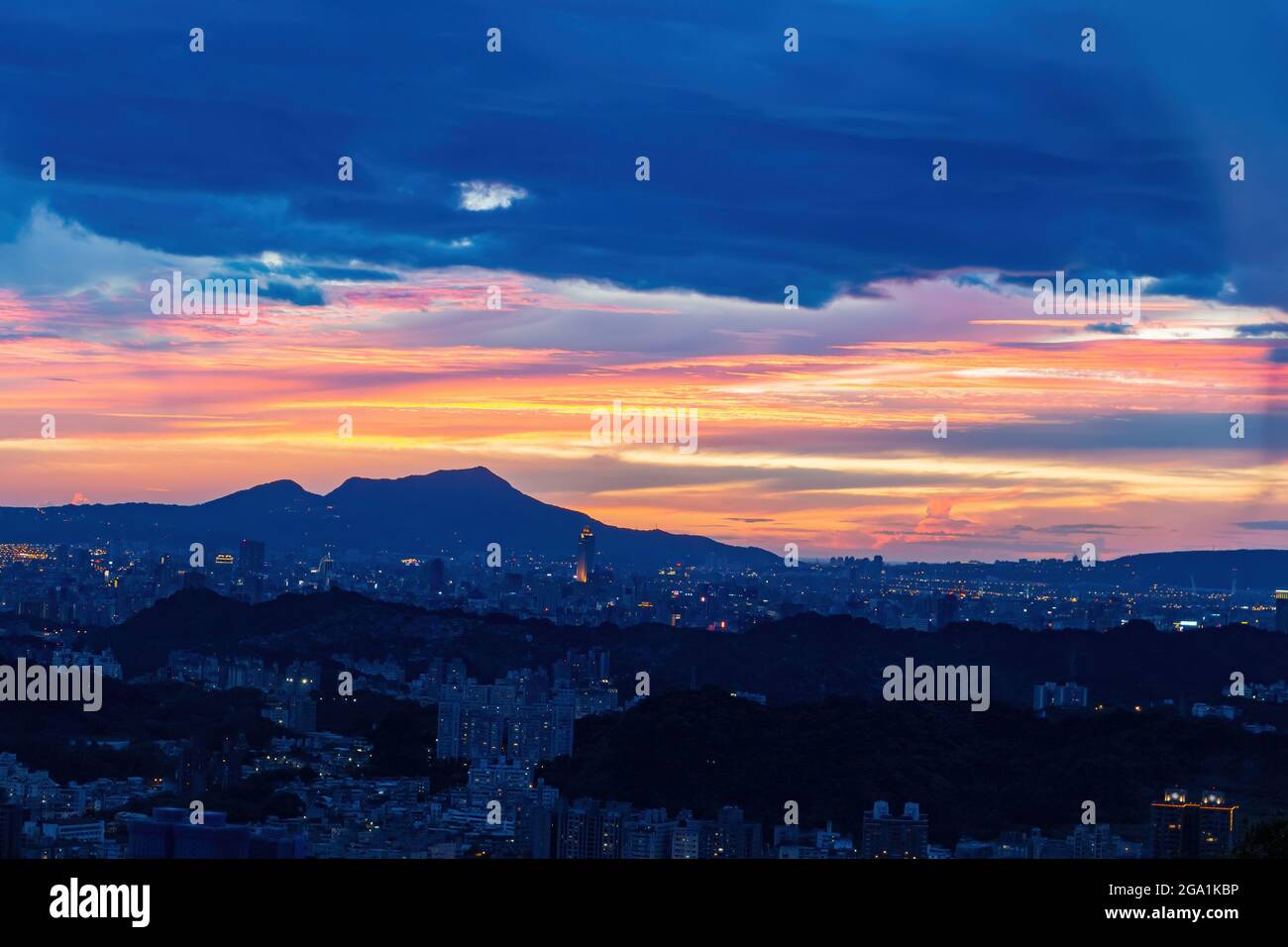 Sunset high angle view of the cityscape form Wenshan District at Taipei ...