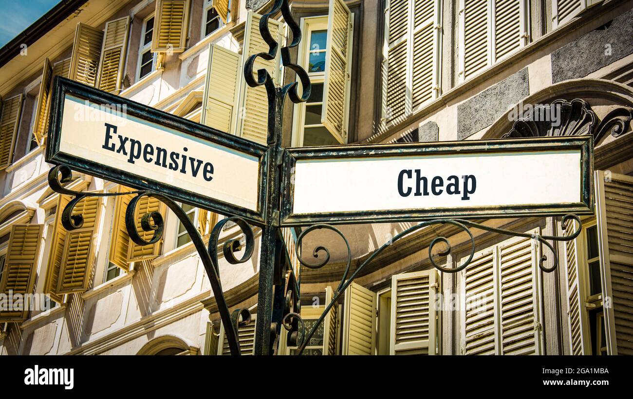 Street Sign the Direction Way to Cheap versus Expensive Stock Photo - Alamy