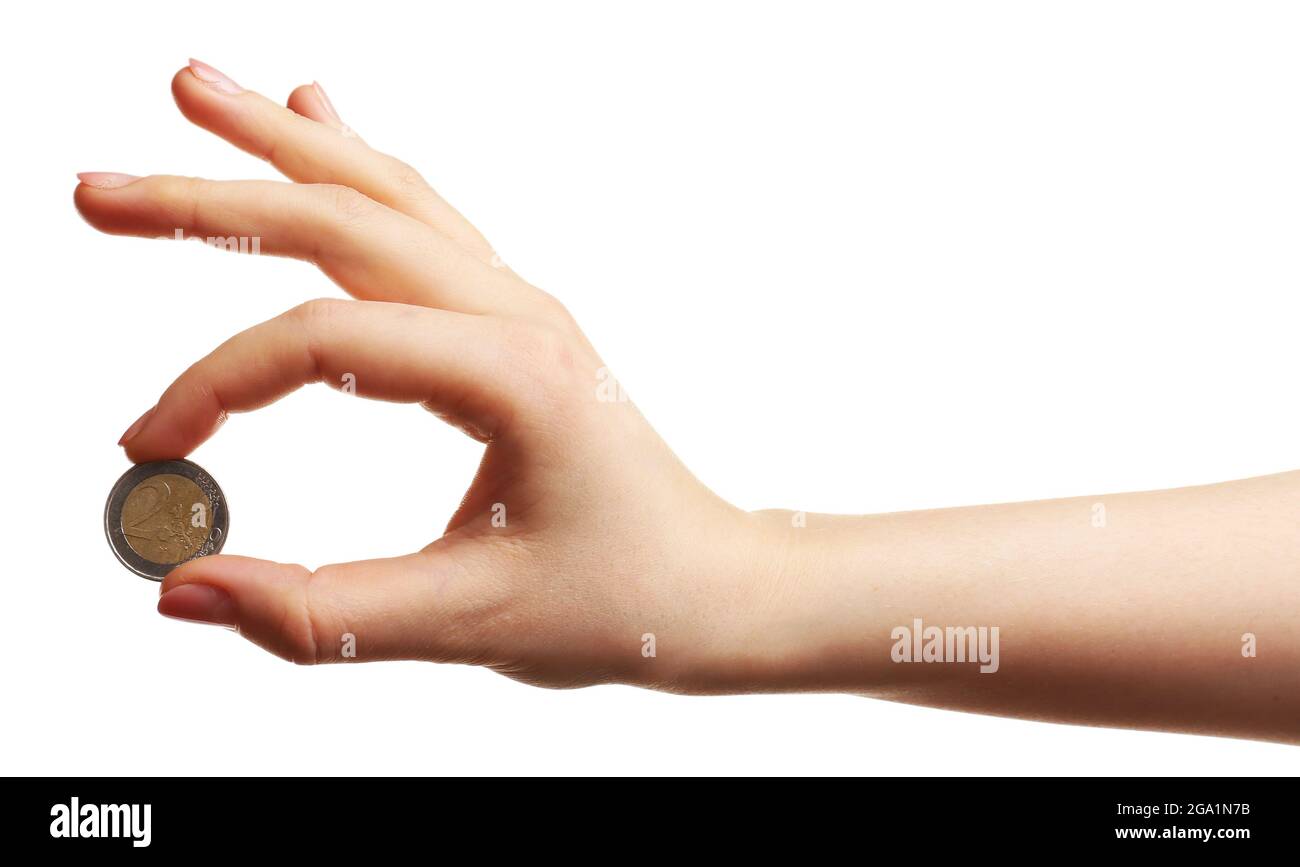 Female hand with coin isolated on white Stock Photo - Alamy