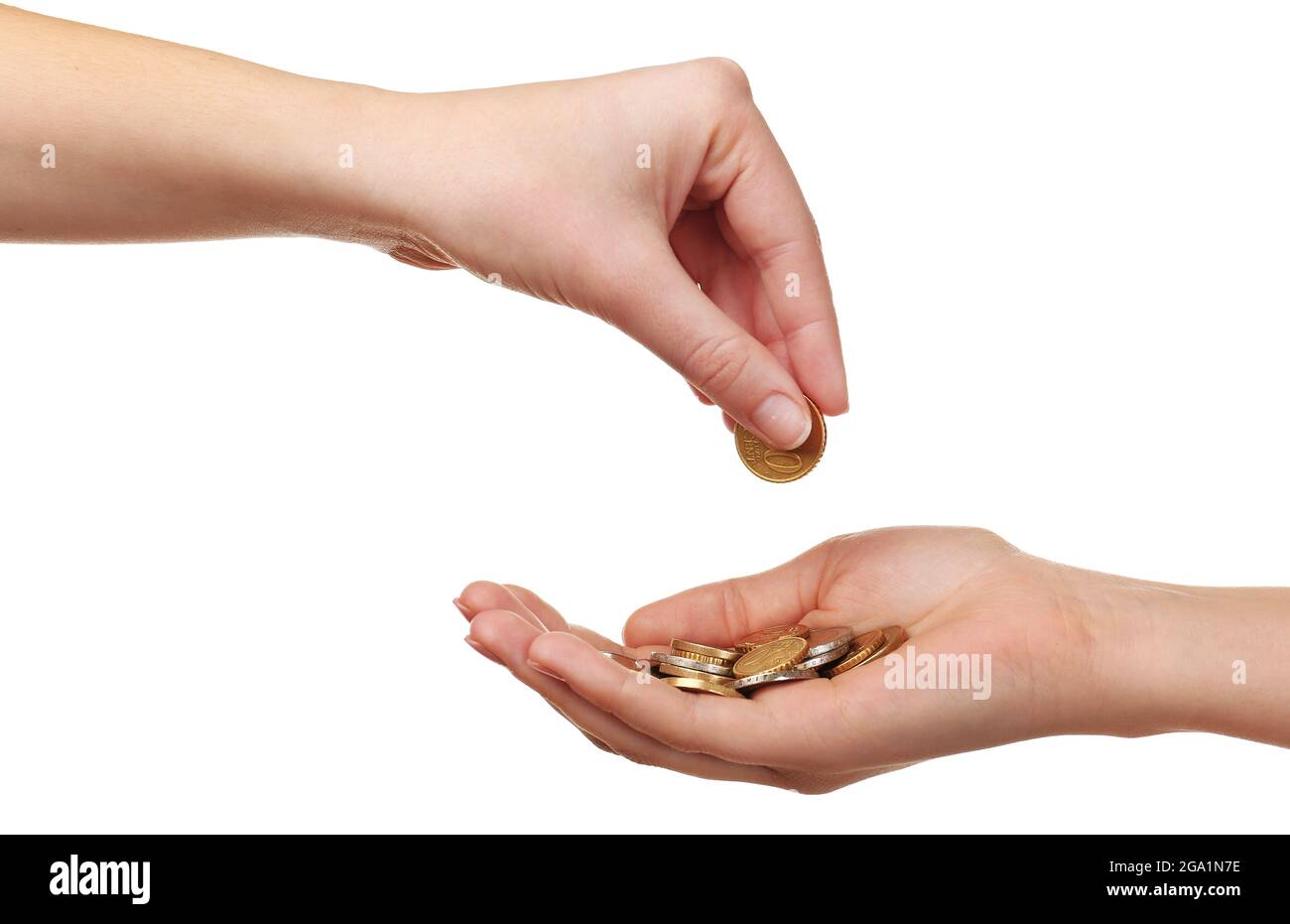 Female hand putting coin into another hand isolated on white Stock ...