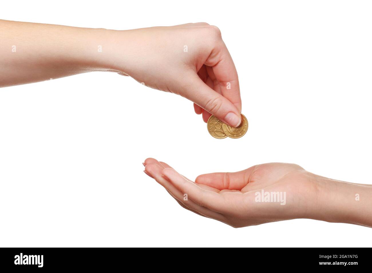 Female hand putting coin into another hand isolated on white Stock ...