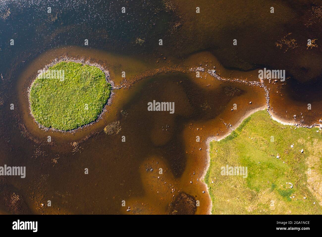 Aerial view from drone of stepping stones leading to ancient island on ...