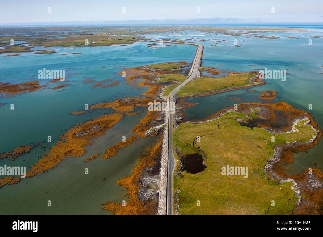 Aerial view from drone of Benbecula road causeways crossing estuaries ...