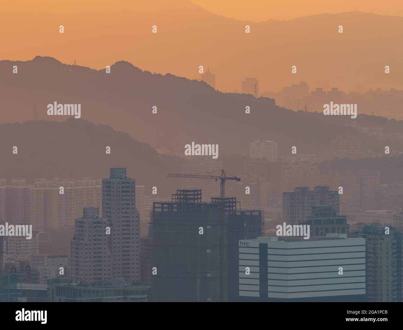 Sunset high angle view of the cityscape form Wenshan District at Taipei ...