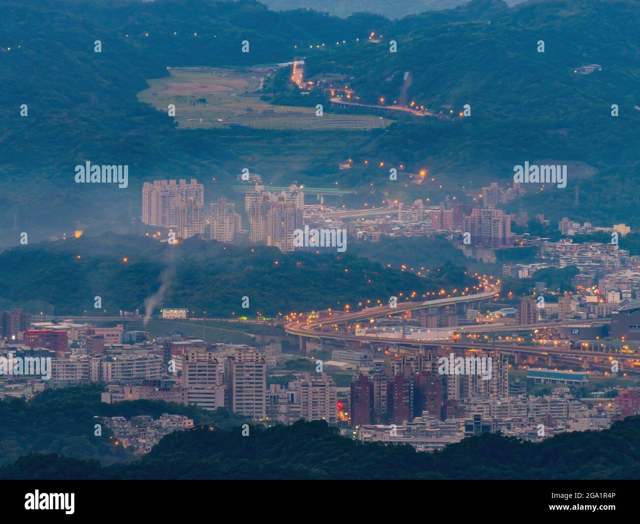 Morning sunrise high angle view of the mountains and cityscape around ...