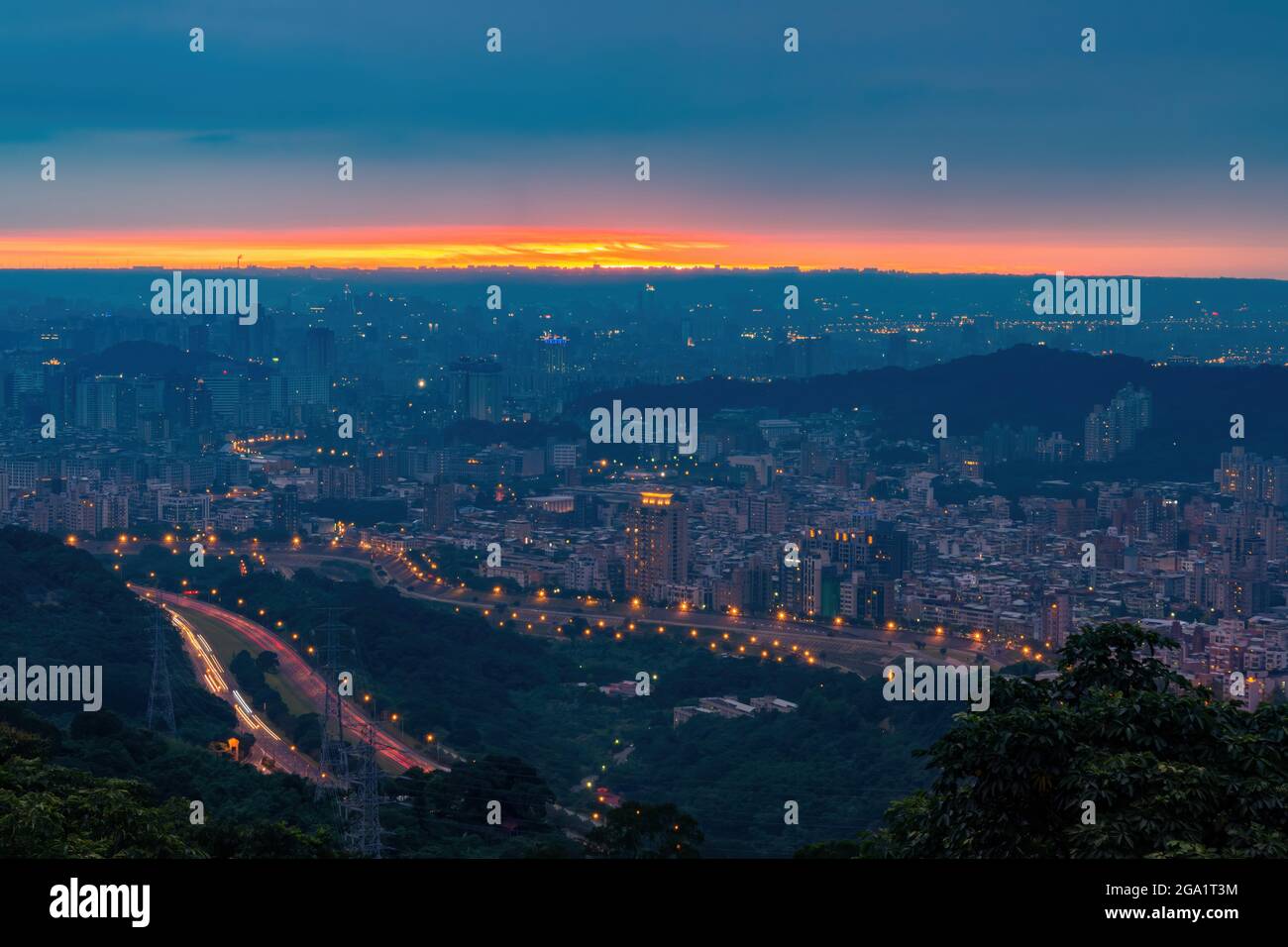 Sunset high angle view of the cityscape form Wenshan District at Taipei ...