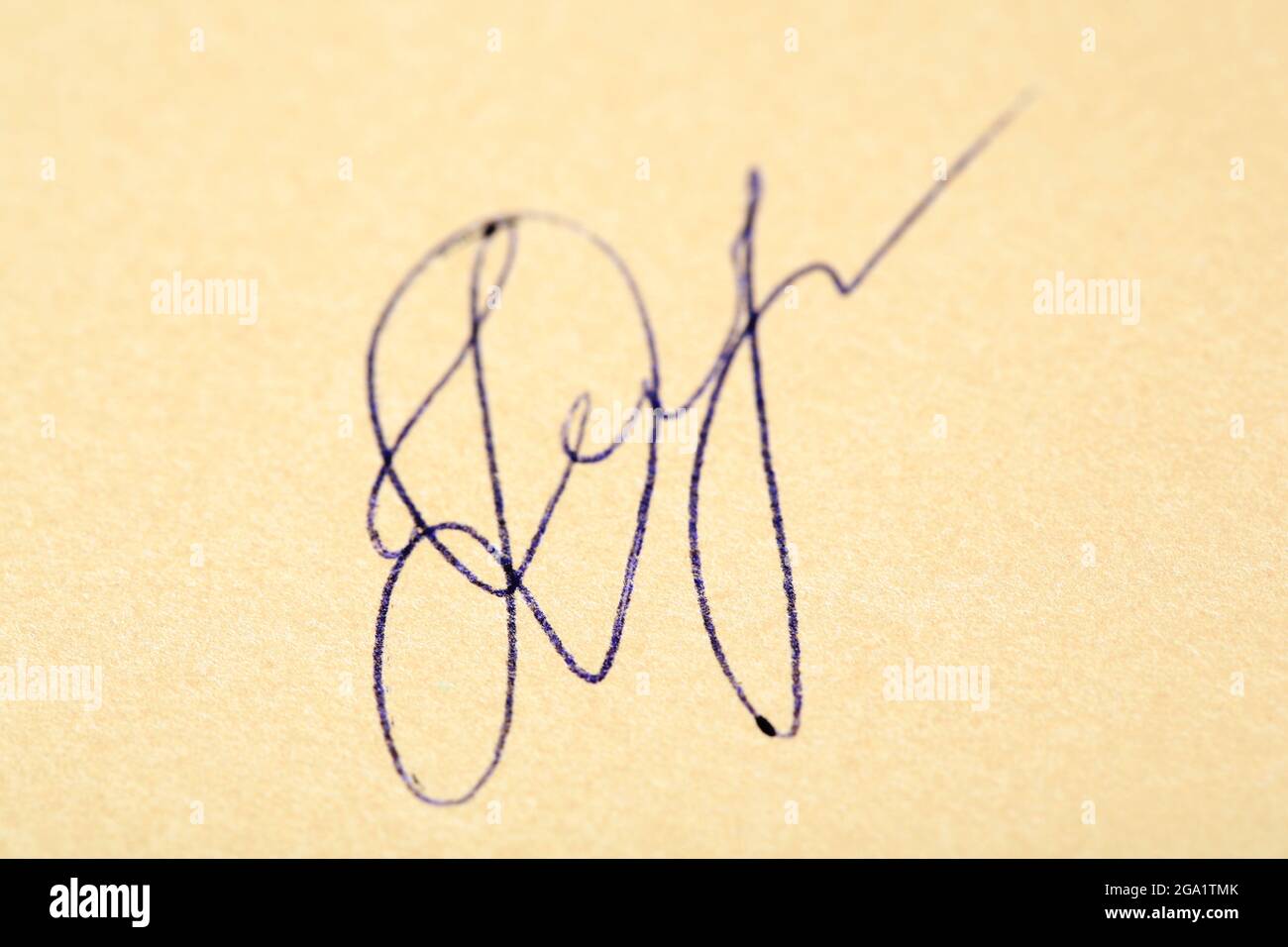 Signature on paper background Stock Photo - Alamy