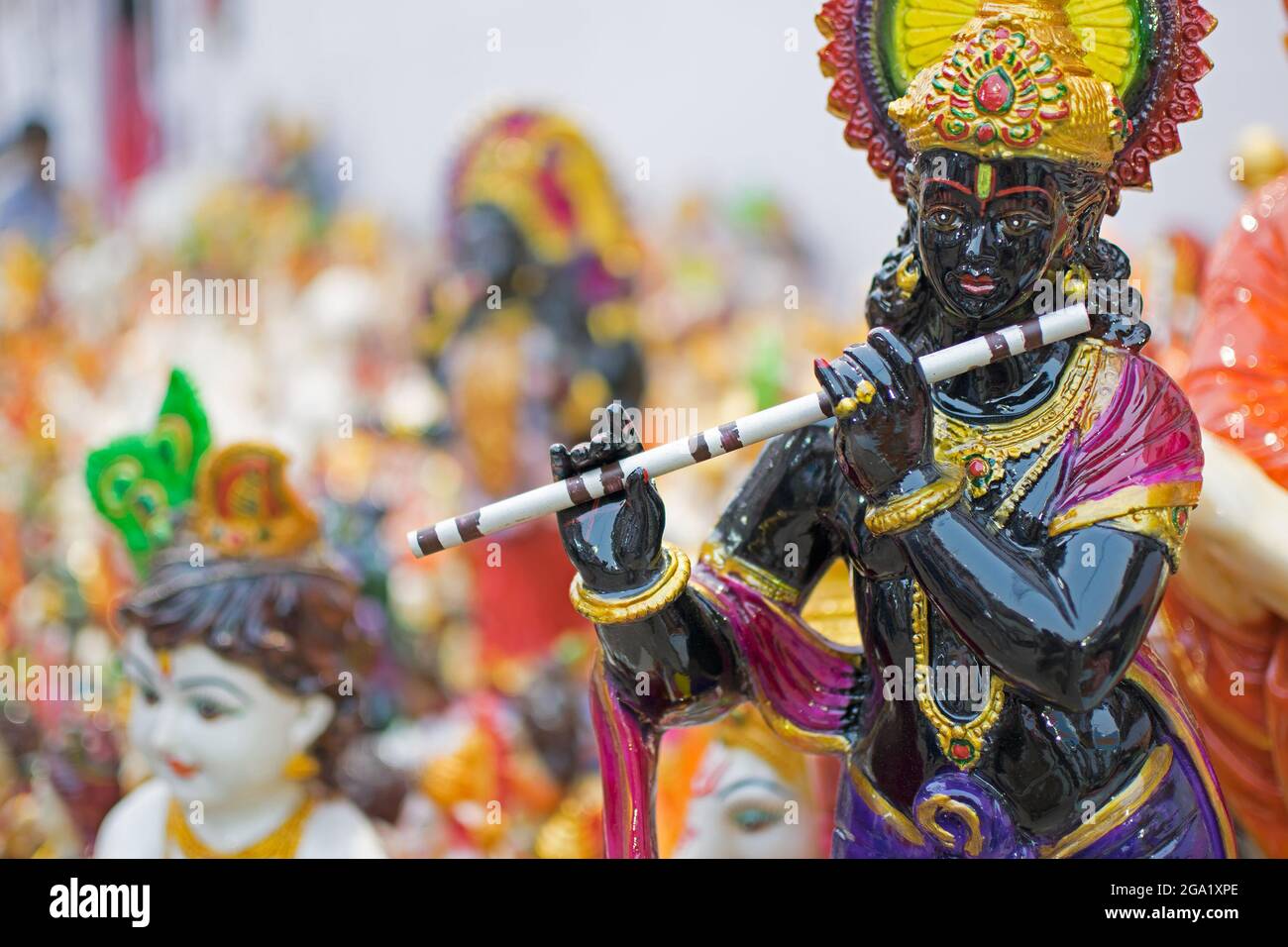 Clay idol of Lord Krishna, handicrafts on display during the Handicraft ...