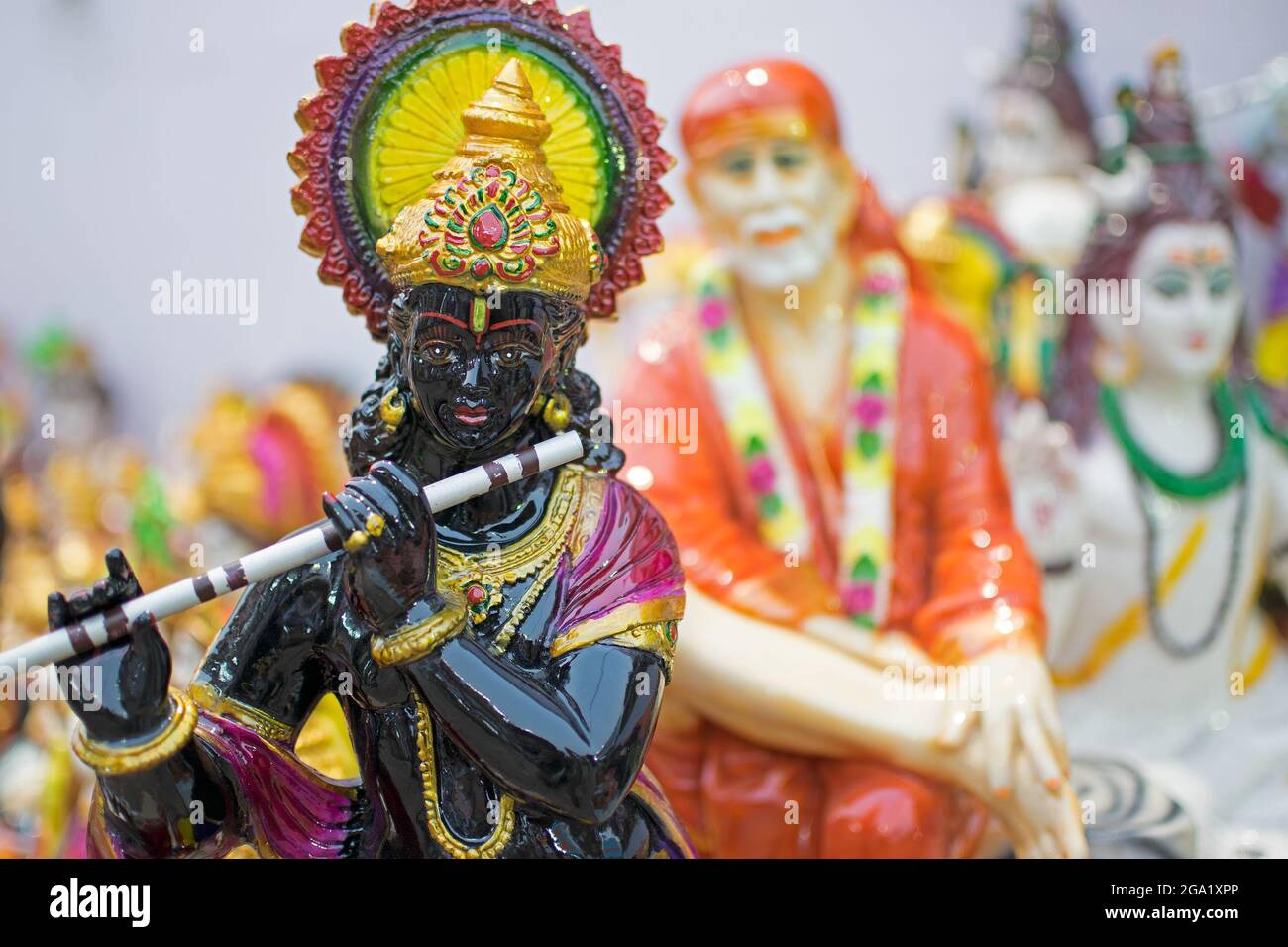 Clay idol of Lord Krishna, handicrafts on display during the Handicraft ...